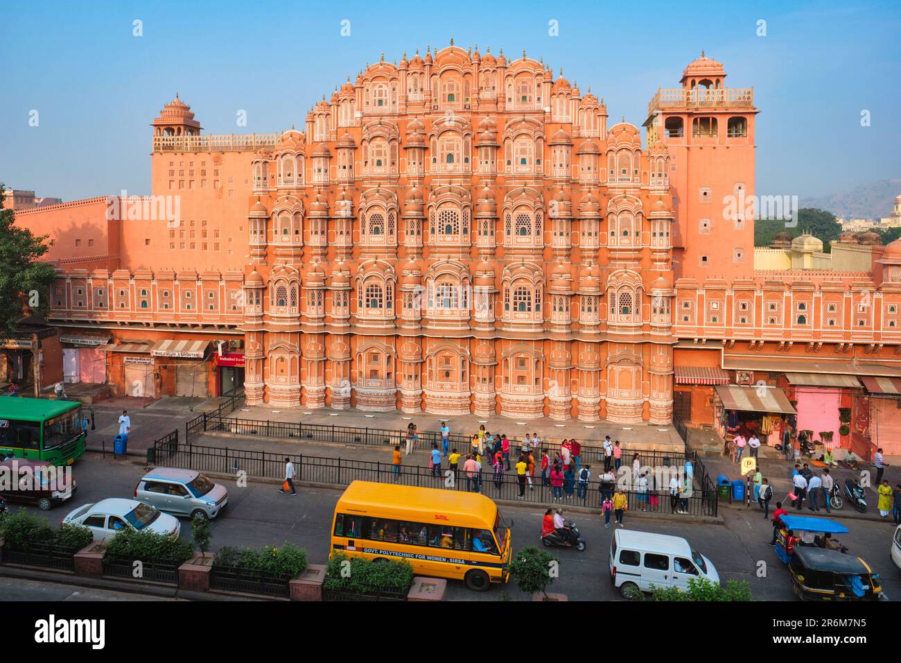 Famous historical landmak pink Hawa Mahal Palace of Winds with people ...