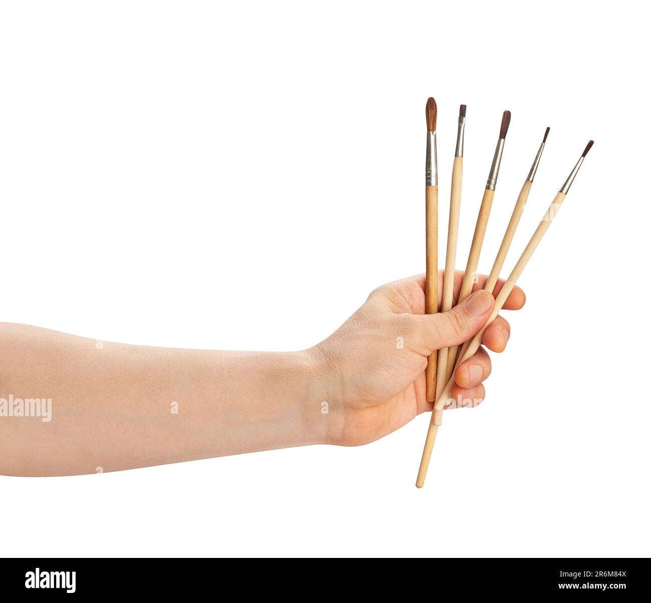 Artist painting hand brush Cut Out Stock Images & Pictures - Alamy