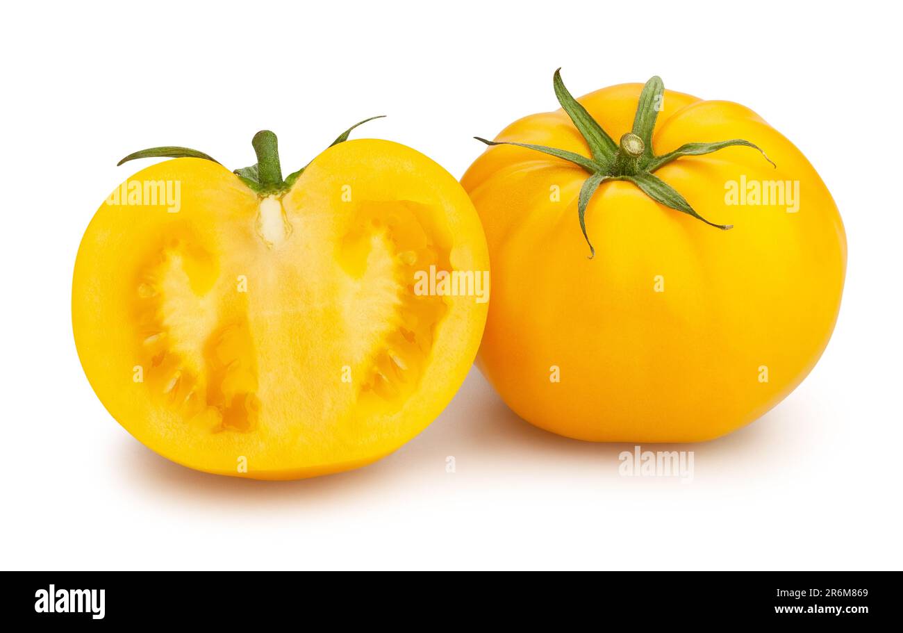 sliced yellow tomato path isolated on white Stock Photo - Alamy