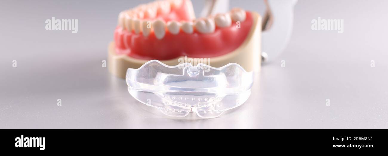 Silicone orthodontic retainers to hold teeth and artificial jaw Stock ...