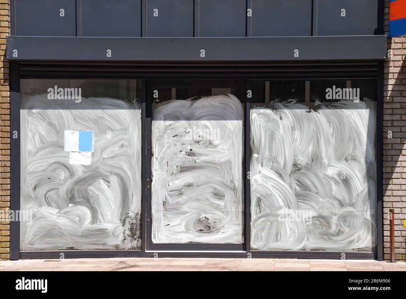 Empty retail unit in a city after the business had clsoed down. No ...