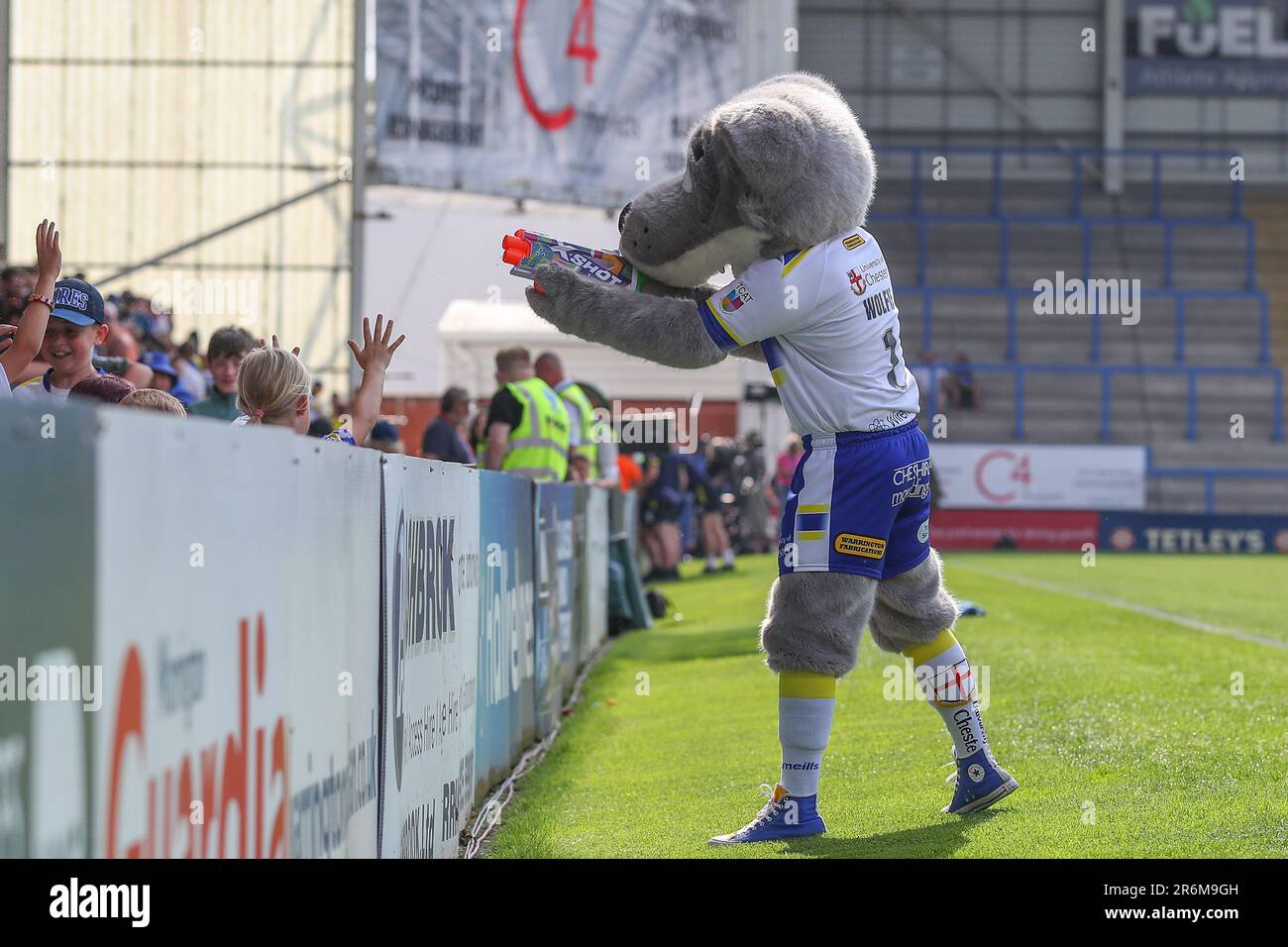Warrington Wolves mascot ‘Wolfie’ sprays fans with water ahead of the ...