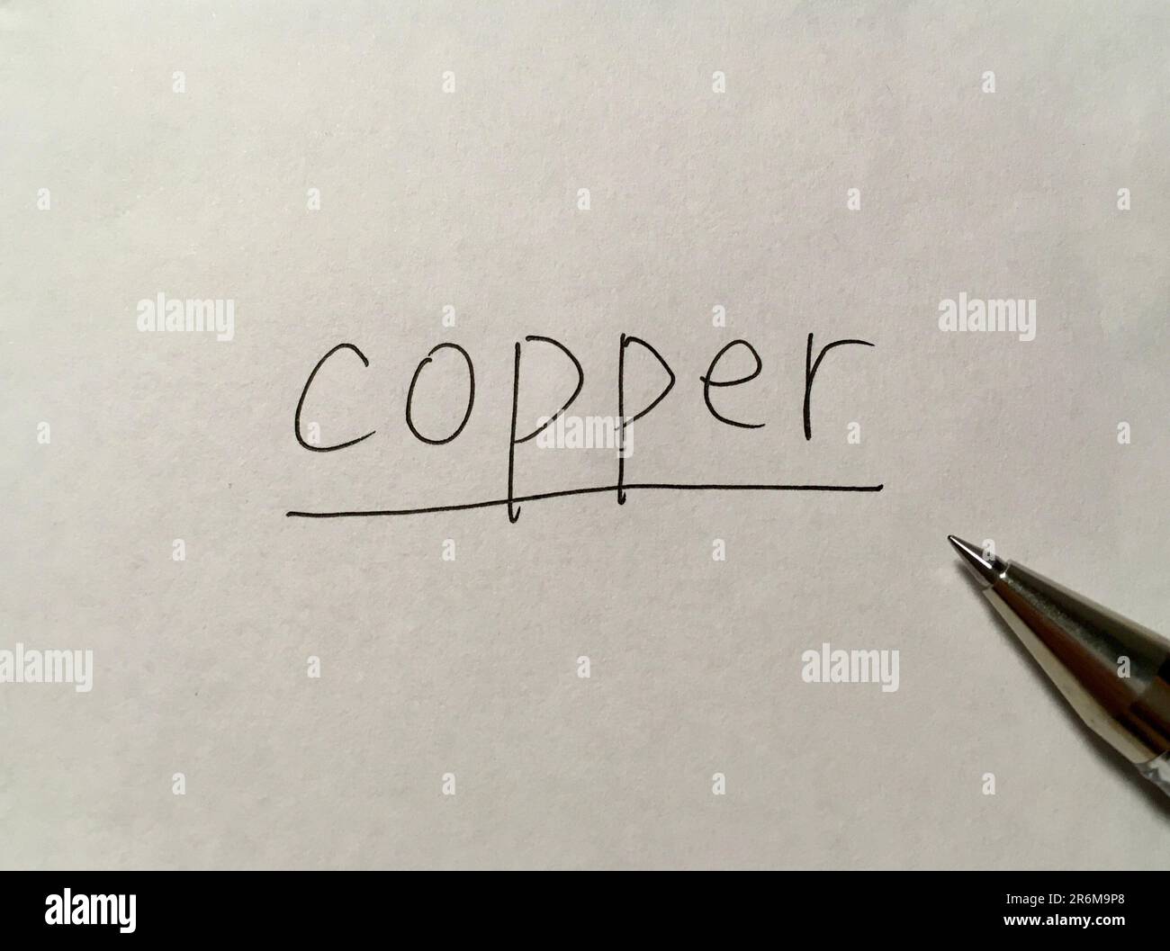 Copper concept word on paper background Stock Photo - Alamy
