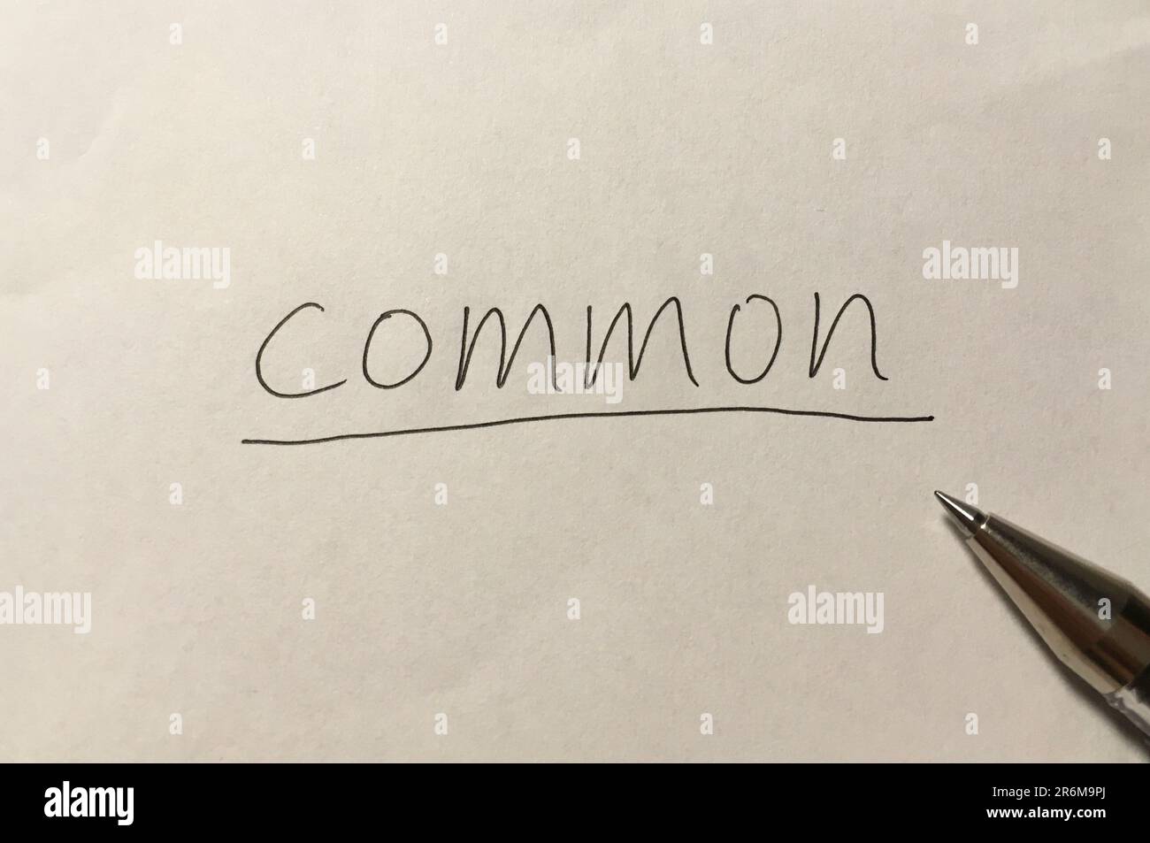 Common concept word on paper background Stock Photo - Alamy