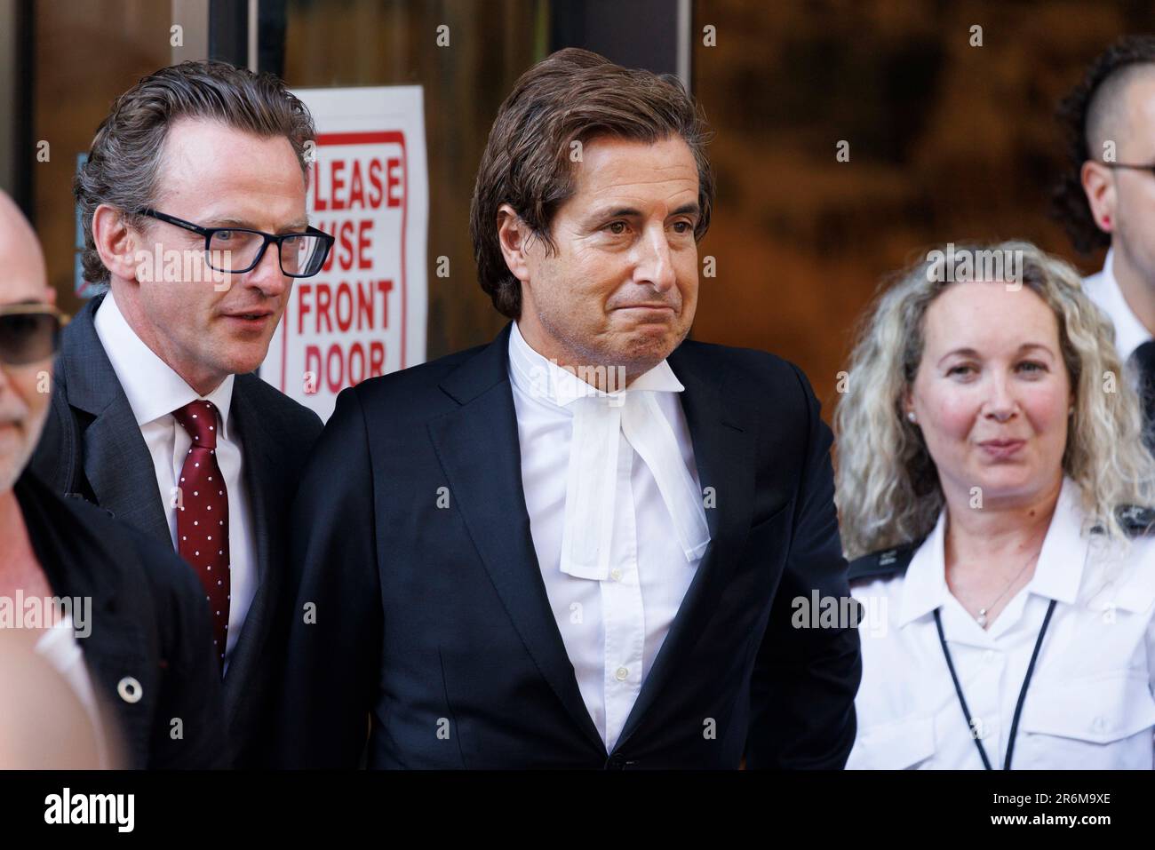 Lawyer David Sherborne (C) leaves the High Court today following the ...