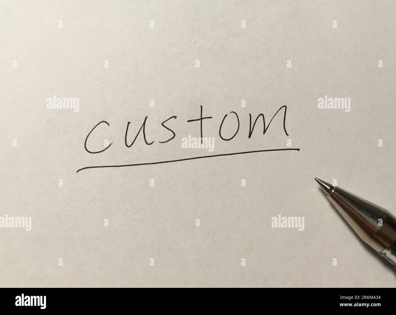 Custom concept word on paper background Stock Photo - Alamy