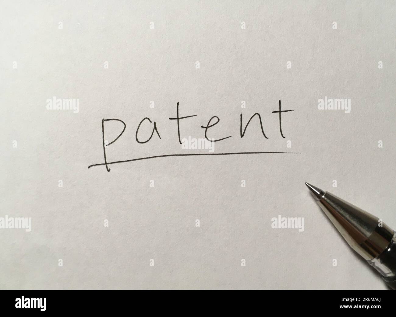 Patent concept word on paper background Stock Photo - Alamy