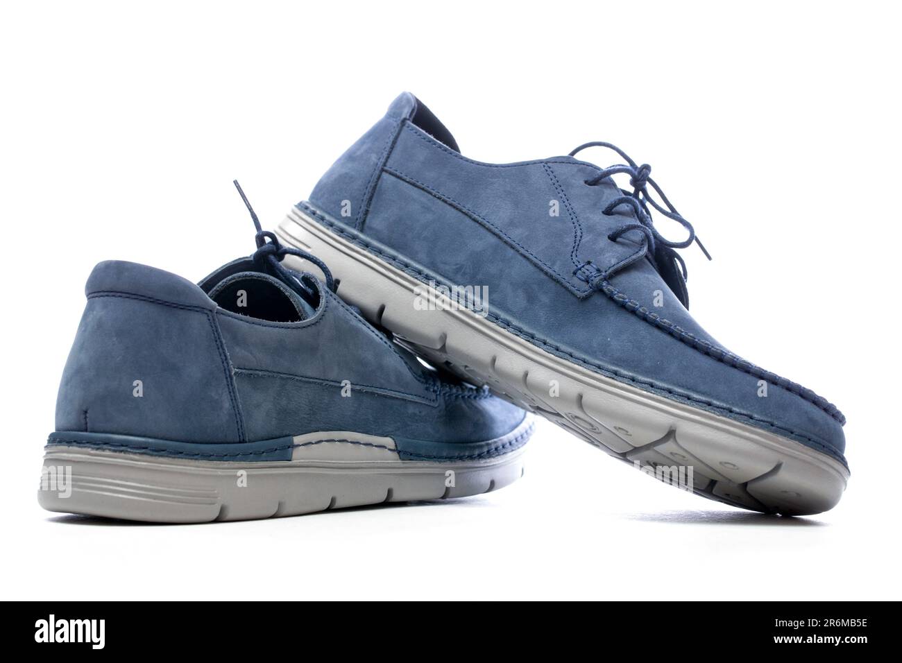 Blue leather men's shoes on a white background Stock Photo - Alamy