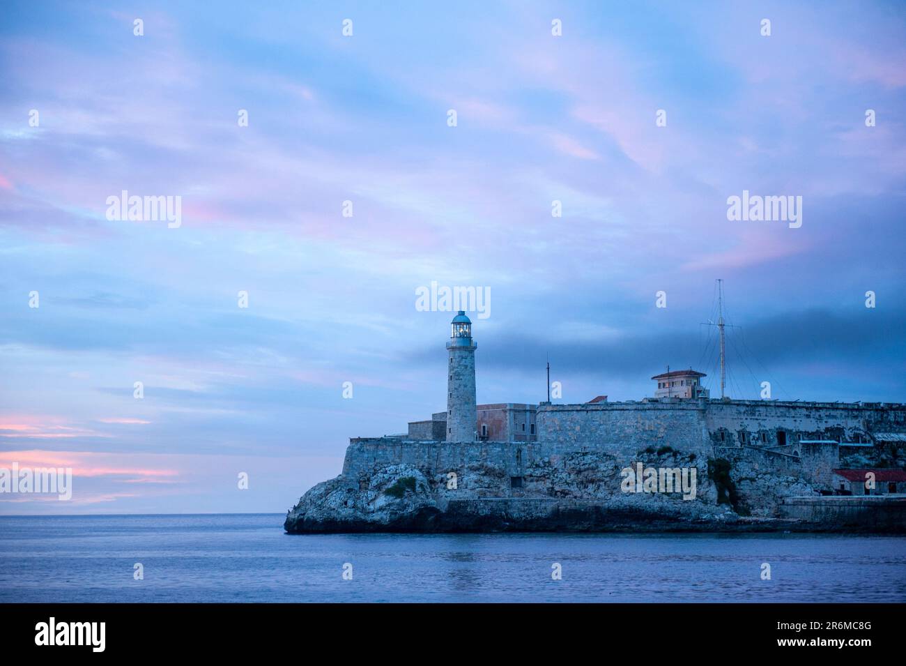 Havana, Cuba. Sunset view of the lighthouse from the walls of the ...