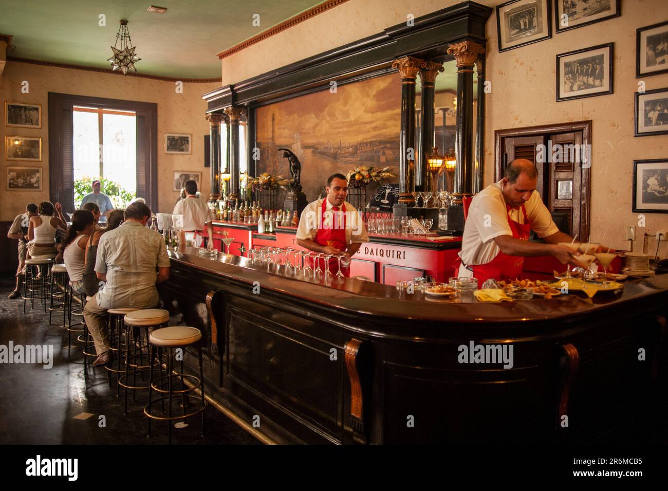 Havana, Cuba. Patrons enjoy their evening at a bar in Havana. Editorial ...