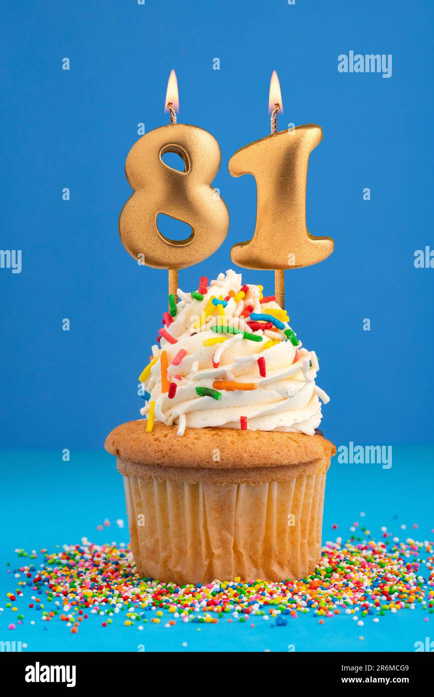 Candle number 81 - Cake birthday in blue background Stock Photo - Alamy
