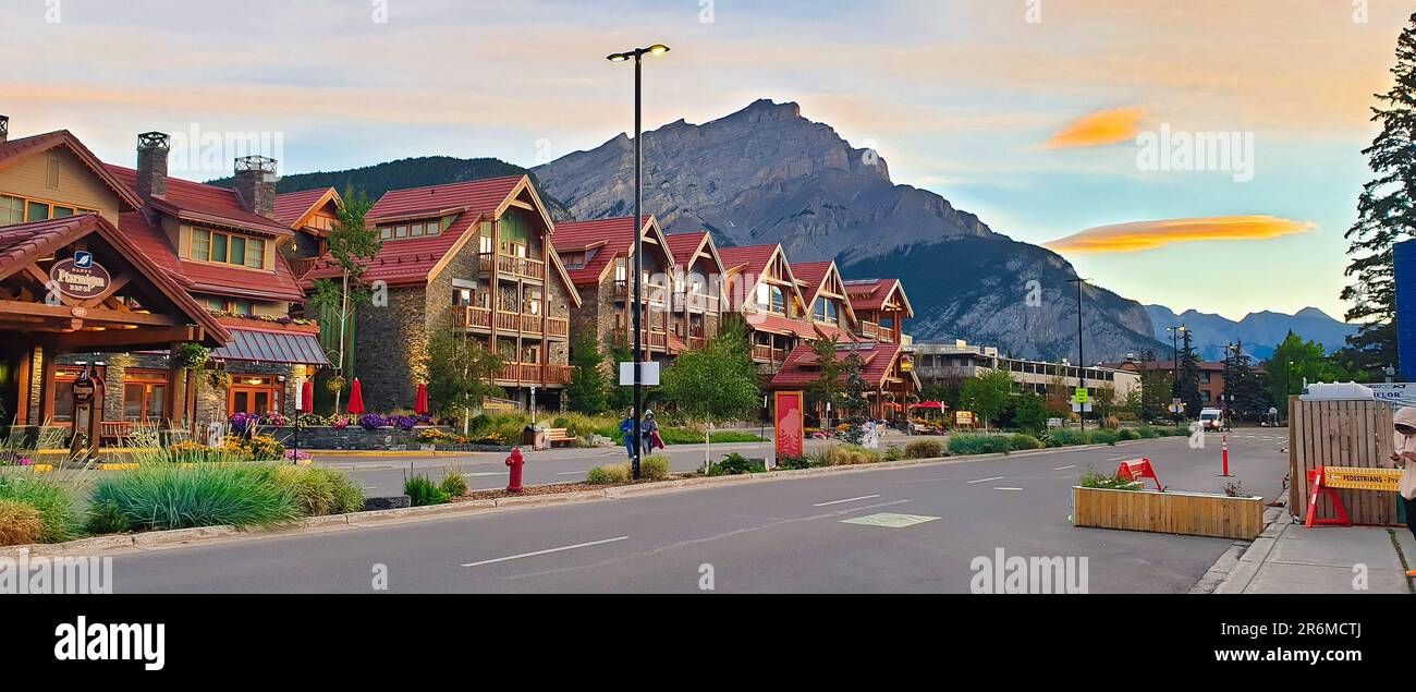 Evening sunset views of Banff Main Avenue with luminescent clouds ...