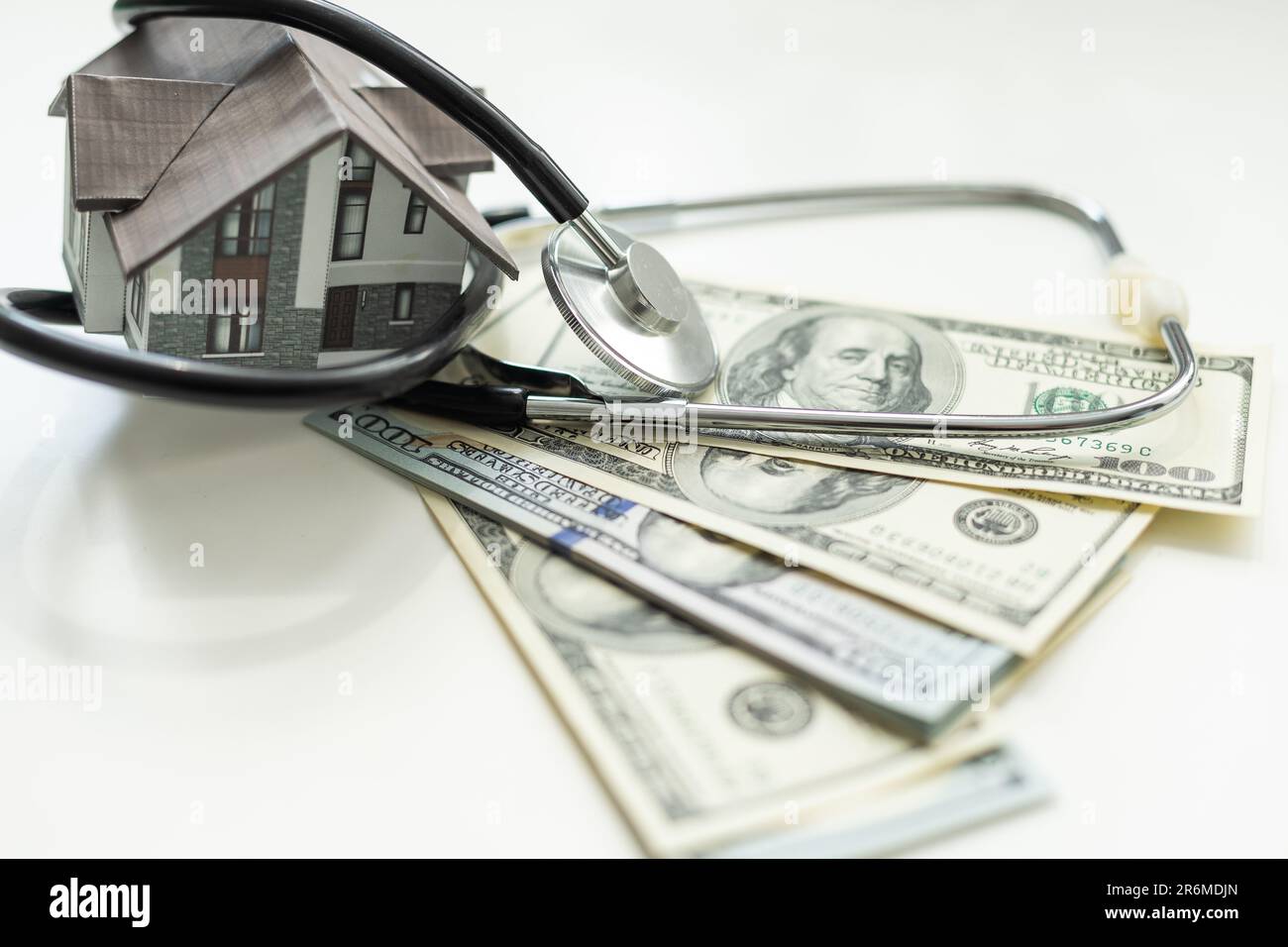 House check. miniature house and stethoscope Stock Photo - Alamy