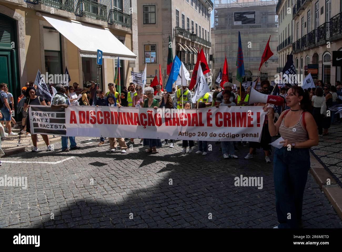 Lisbon, Portugal. 10th June, 2023. Activists hold banners and flags ...