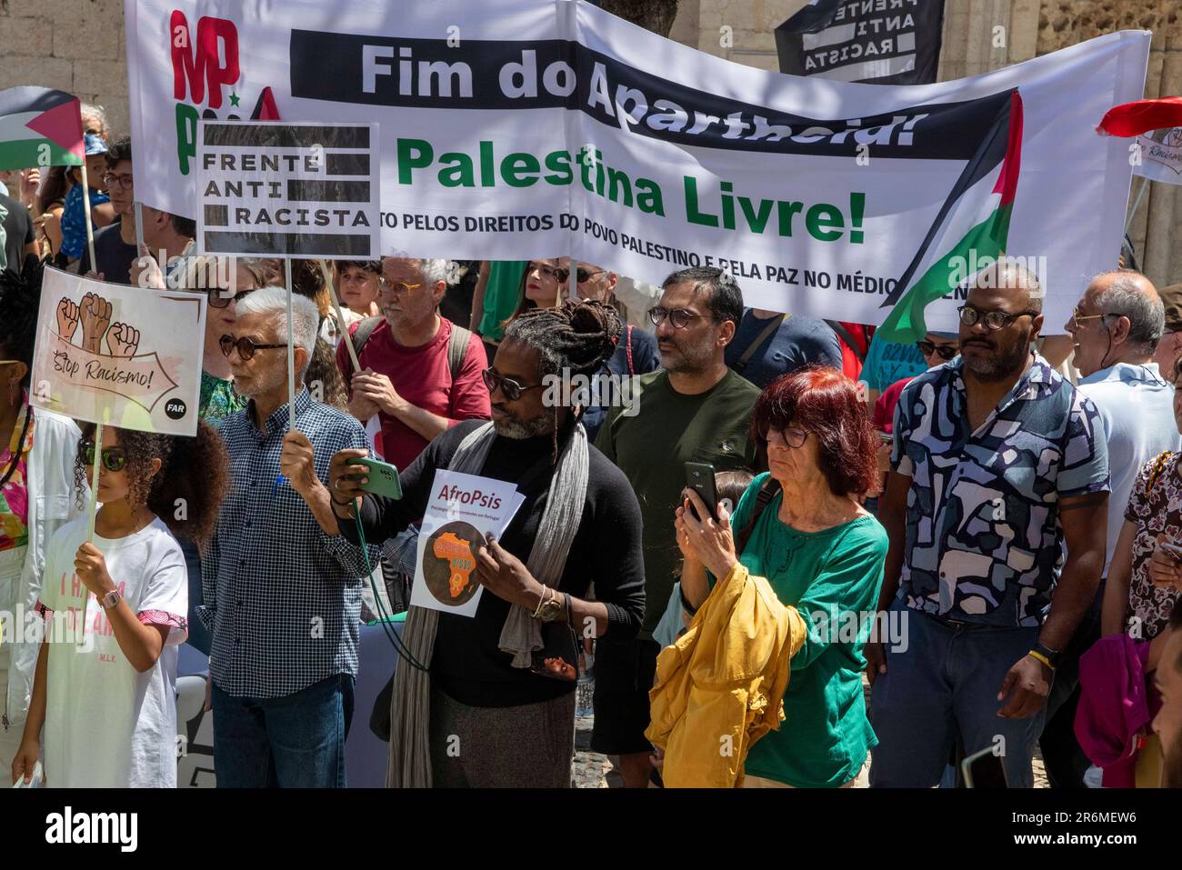 Lisbon, Portugal. 10th June, 2023. Activists with an anti-racist banner ...