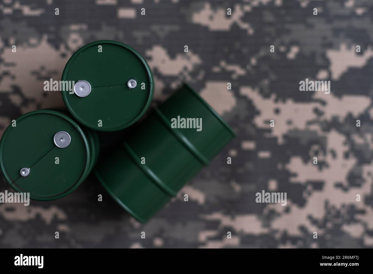 a military uniform and a toy barrel oil Stock Photo - Alamy
