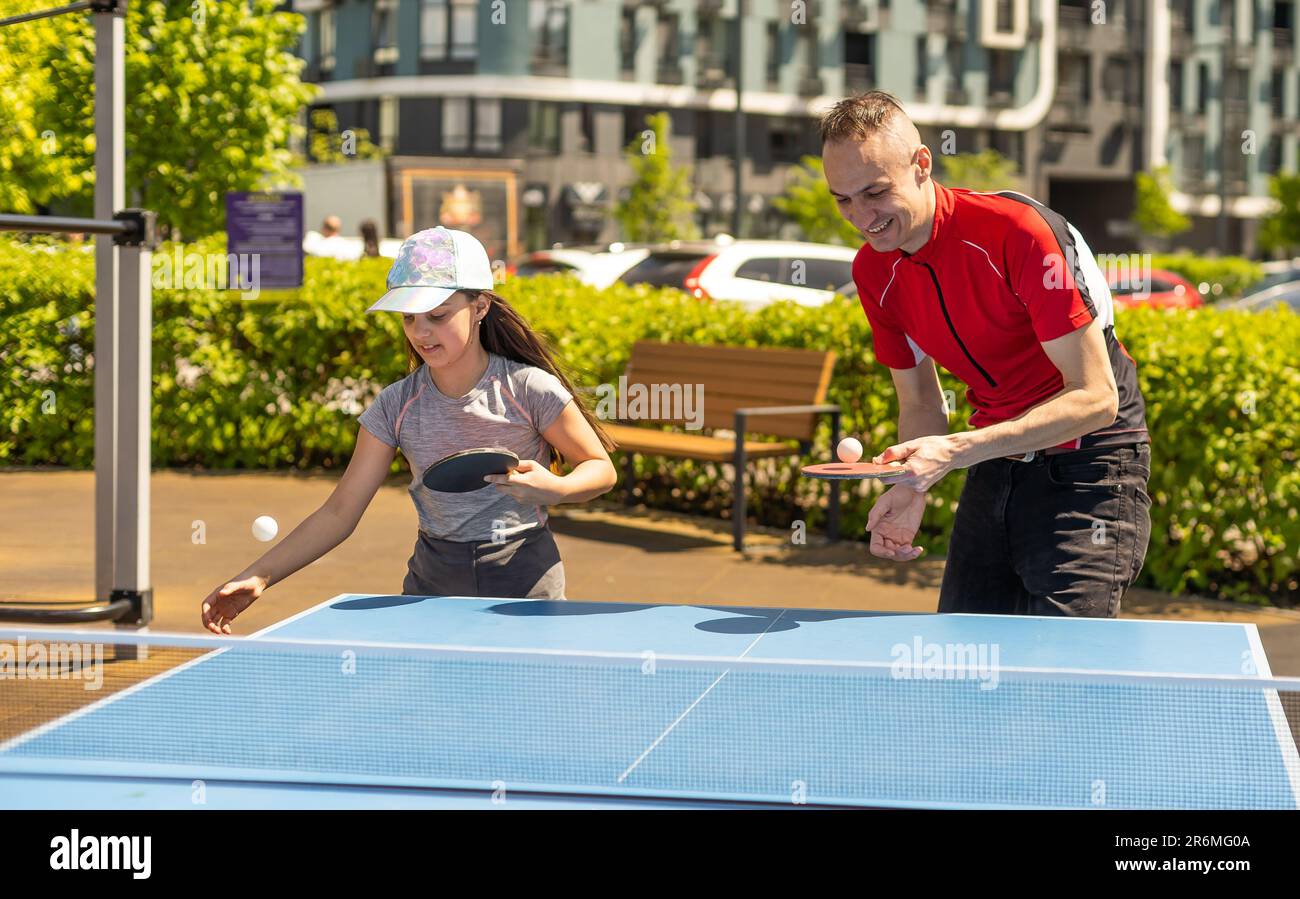 Family mother son playing tennis hi-res stock photography and images ...