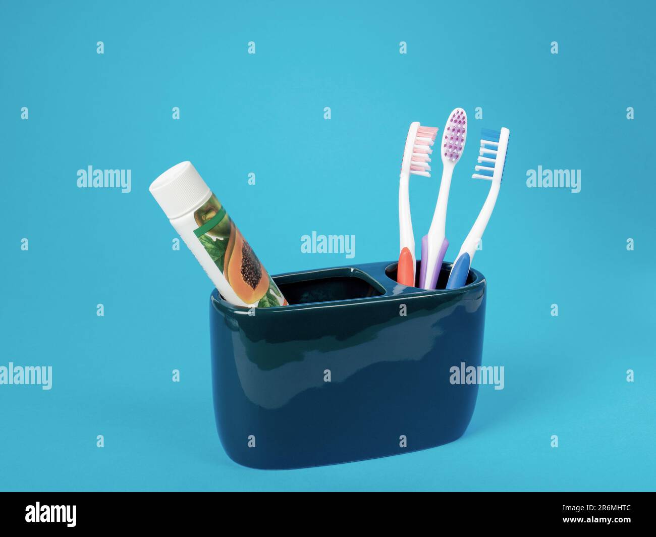 Toothbrush toothpaste blue background hi-res stock photography and ...