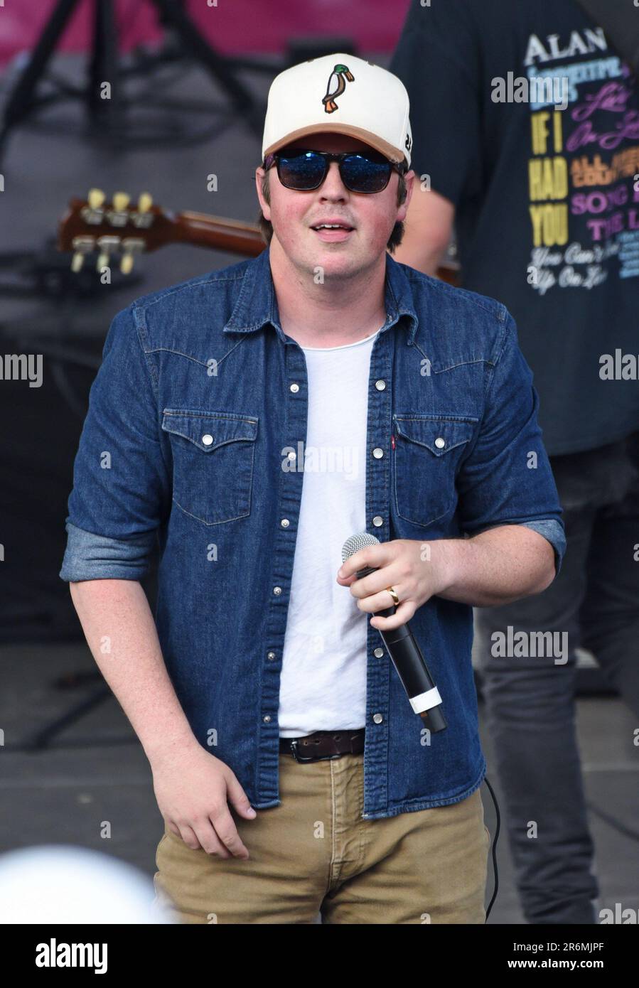 Nashville, TN, USA. 8th June, 2023. Travis Denning on stage for CMA ...