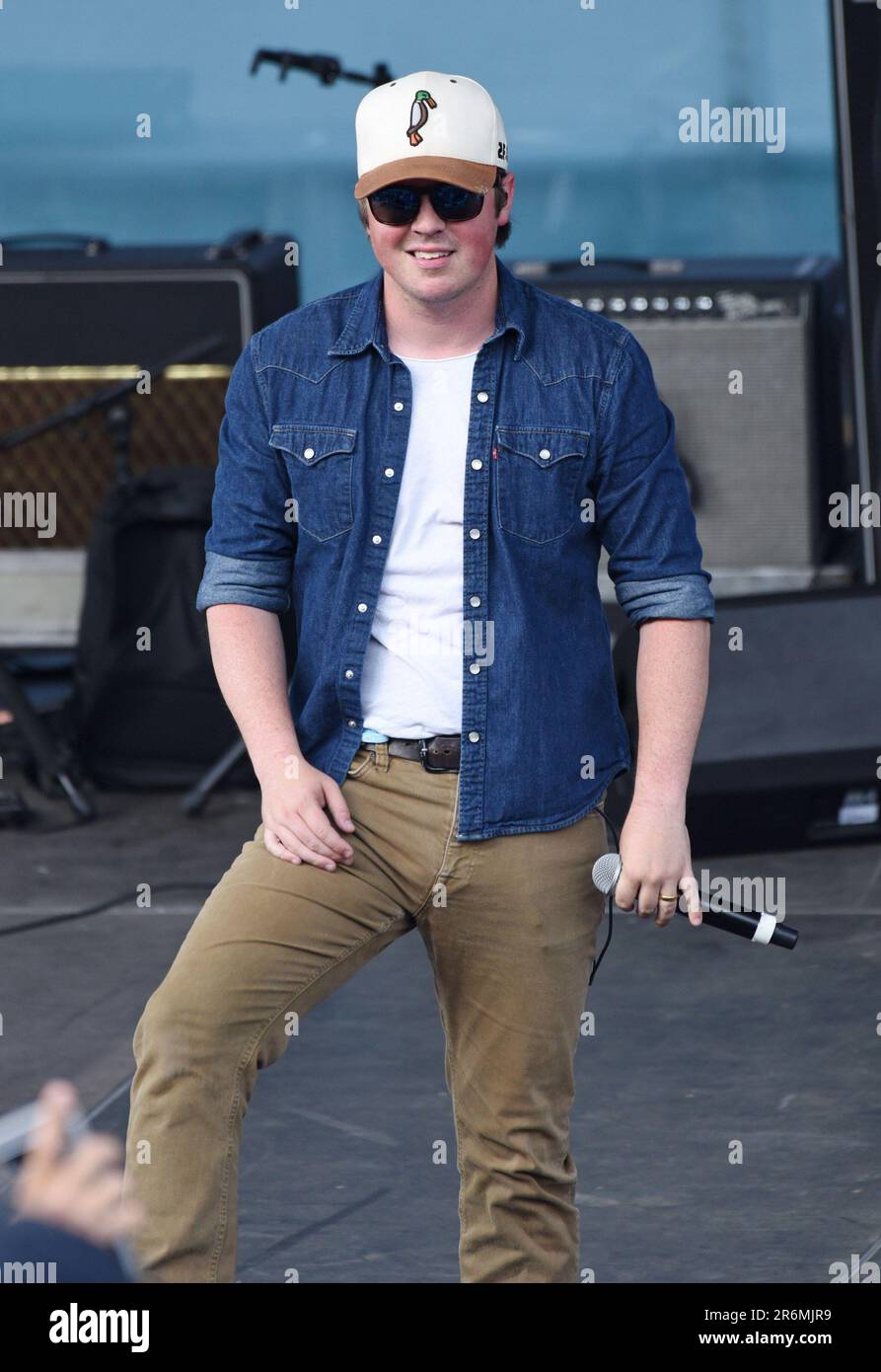Nashville, TN, USA. 8th June, 2023. Travis Denning on stage for CMA ...