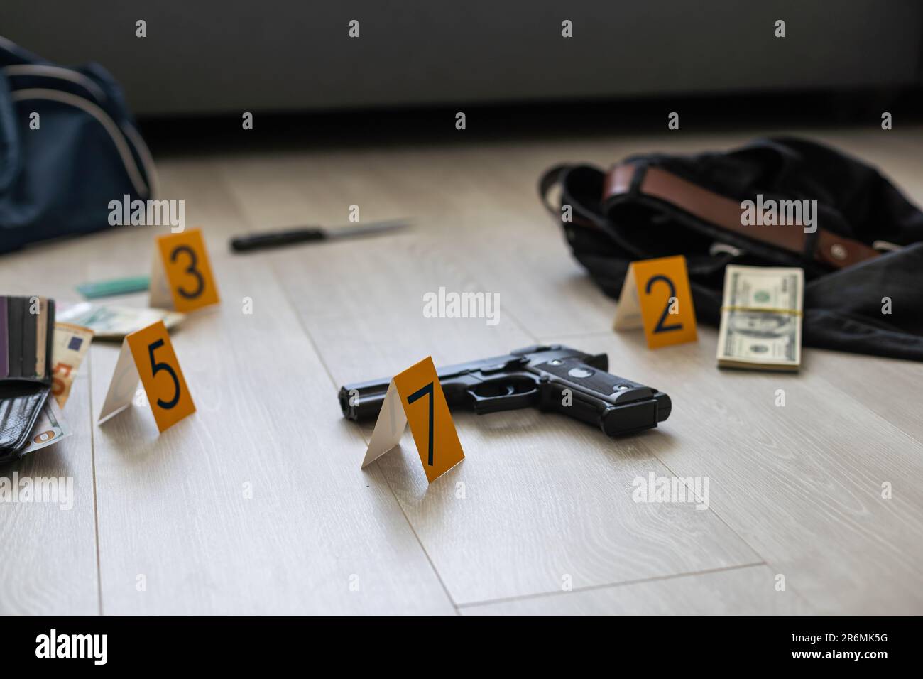 High contrast image of a crime scene with evidence markers Stock Photo ...