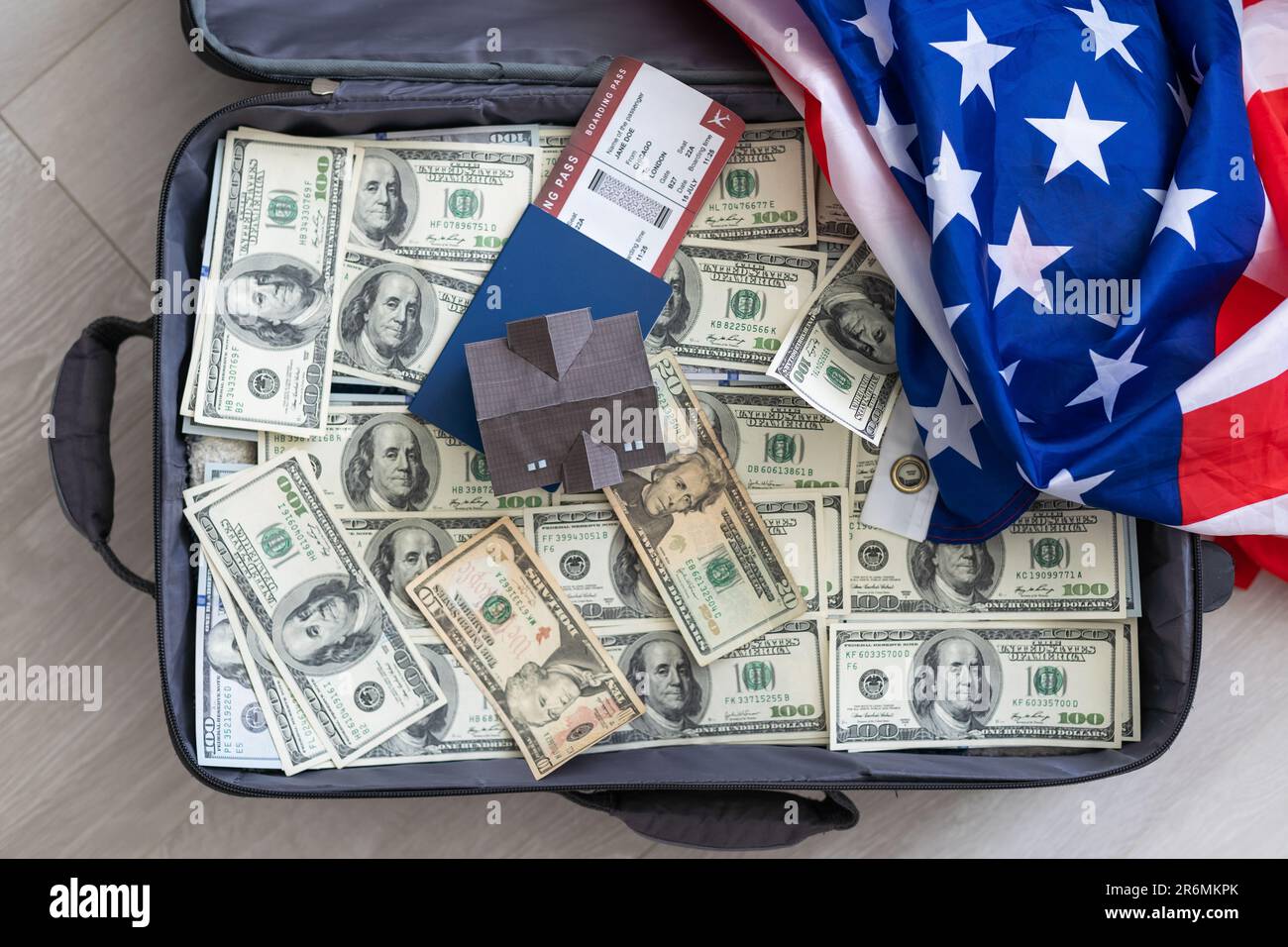 Open suitcase with one million dollars bills stacks Stock Photo - Alamy