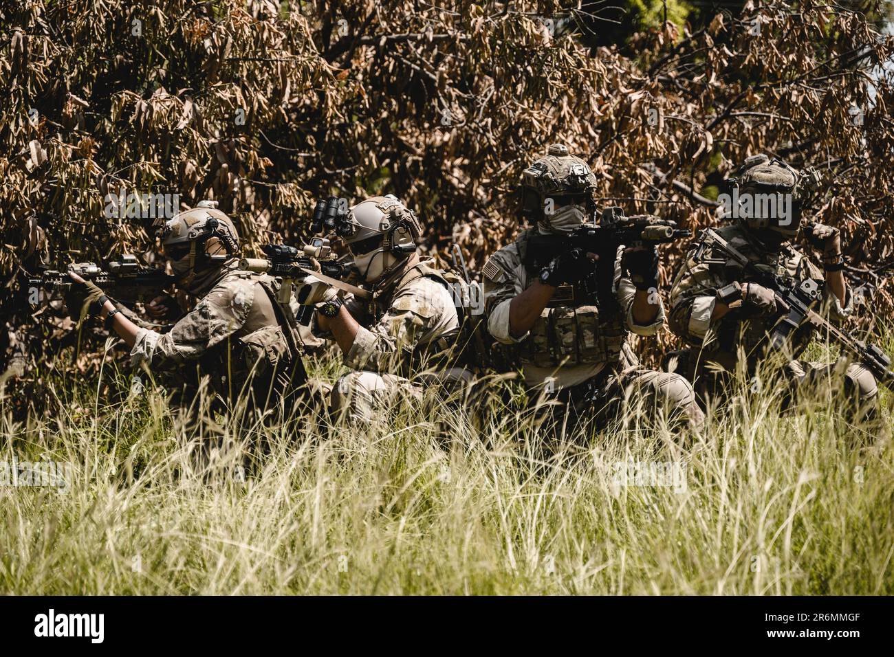 Soldiers running forward and attacking enemy during military operation ...