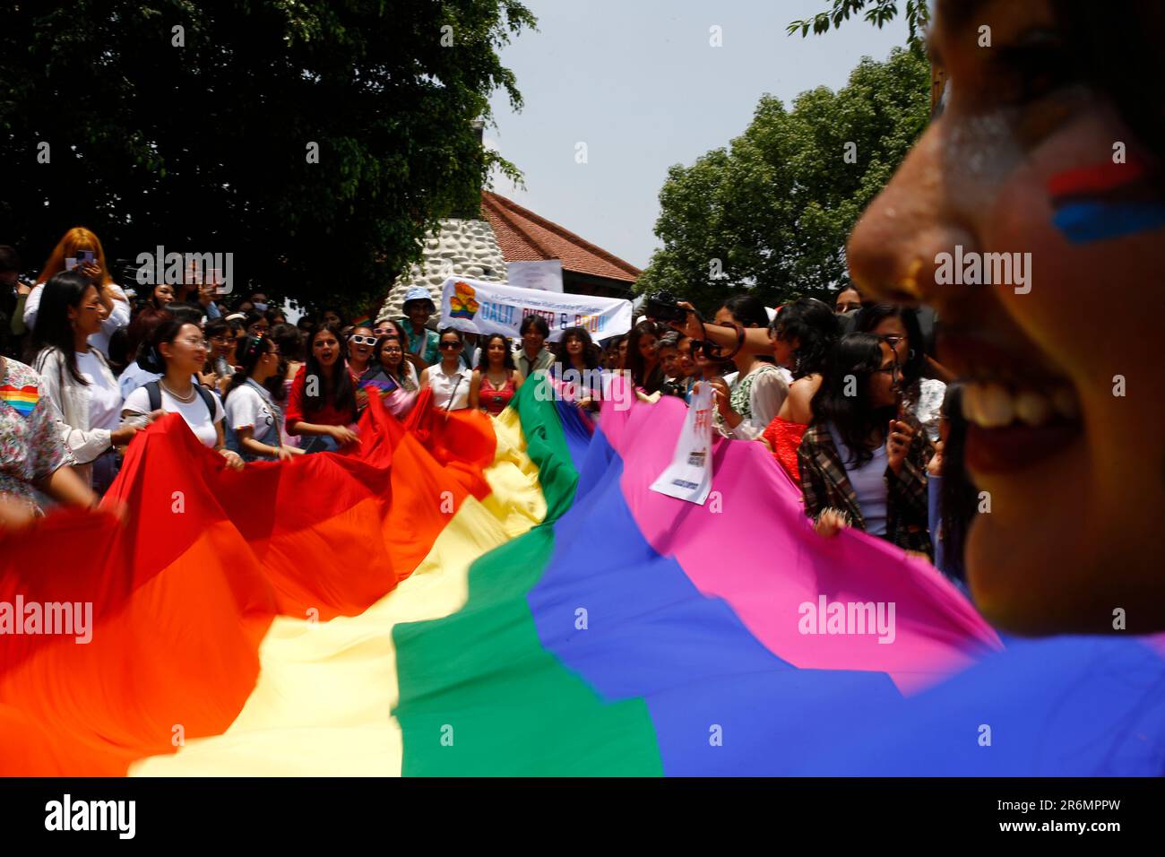 Kathmandu, Nepal. 10th June, 2023. Hundreds of people from the LGBTIQ community wave their ...