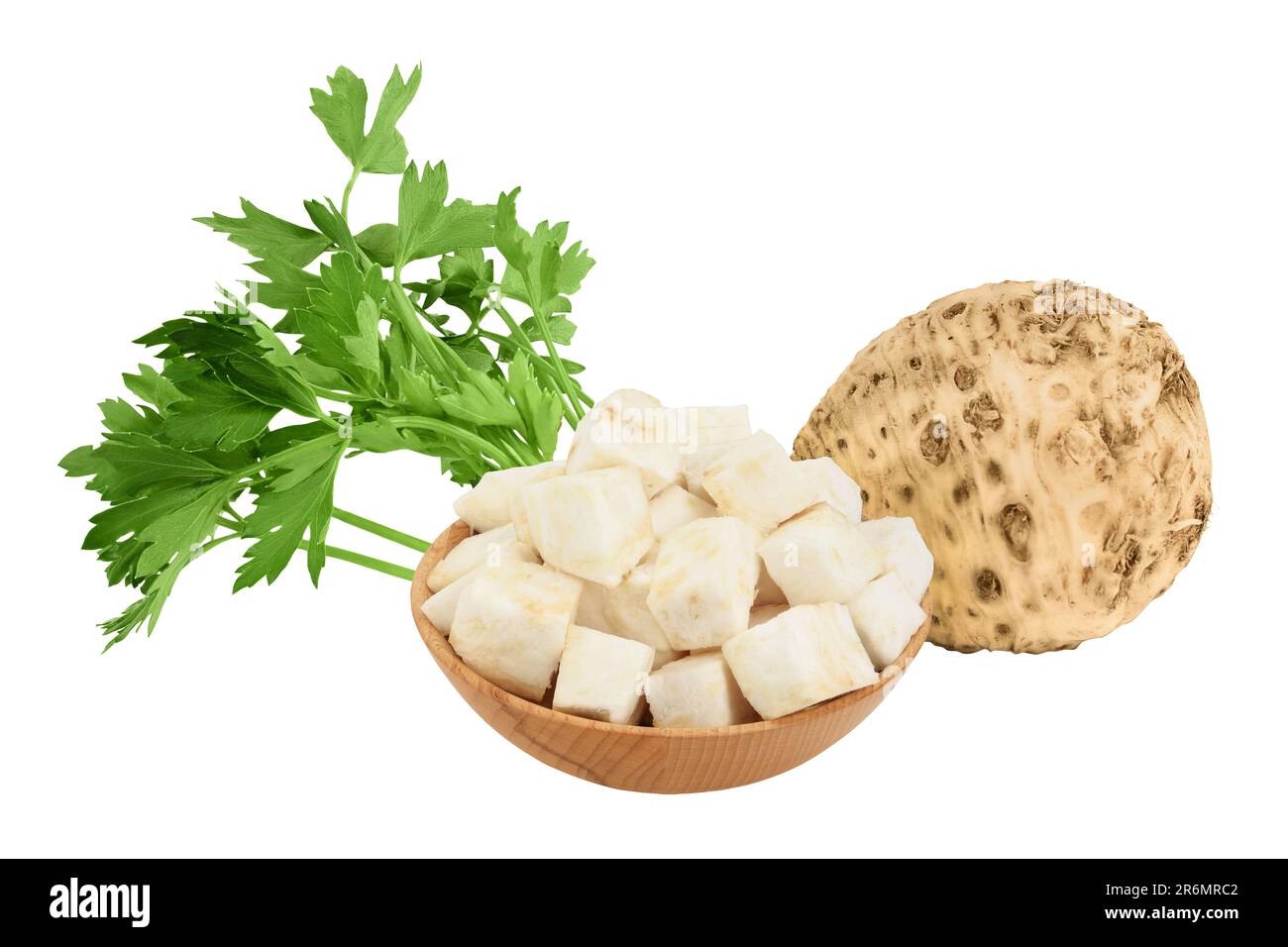 diced celery root in wooden bowl isolated on white background Stock ...