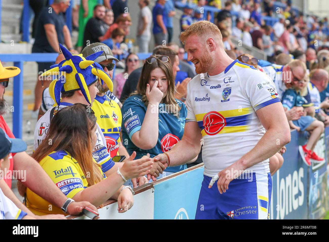 Joe Bullock #19 of Warrington Wolves speaks to fans after the Betfred ...