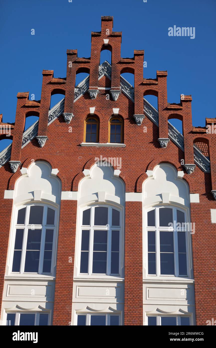 The gable wall of the building is in the Neo-Gothic style with large ...