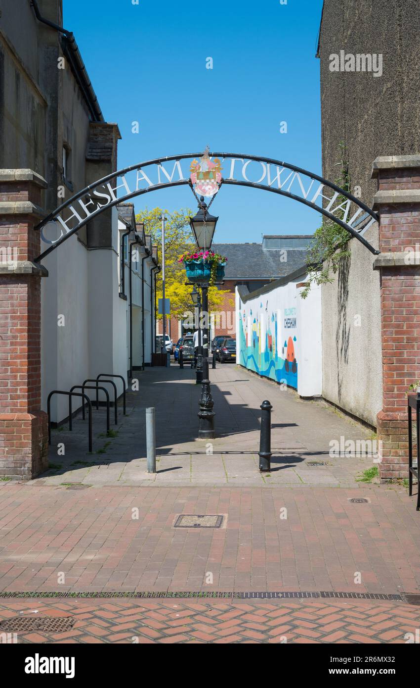 Metal archway with Chesham town hall name and coat of arms straddling ...