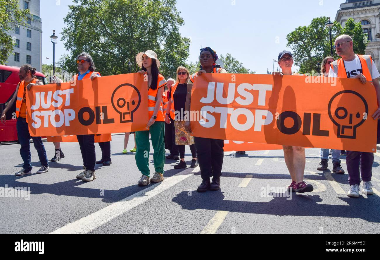 Stop oil activists holding hi-res stock photography and images - Alamy