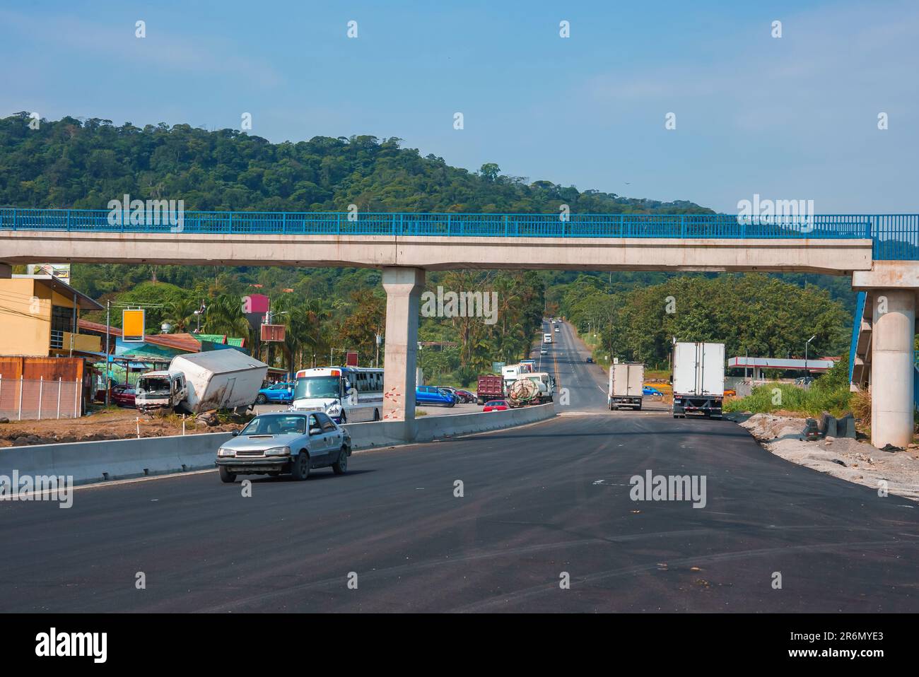 Bridge over country asphalt road with beautiful scenery on a sunny day ...