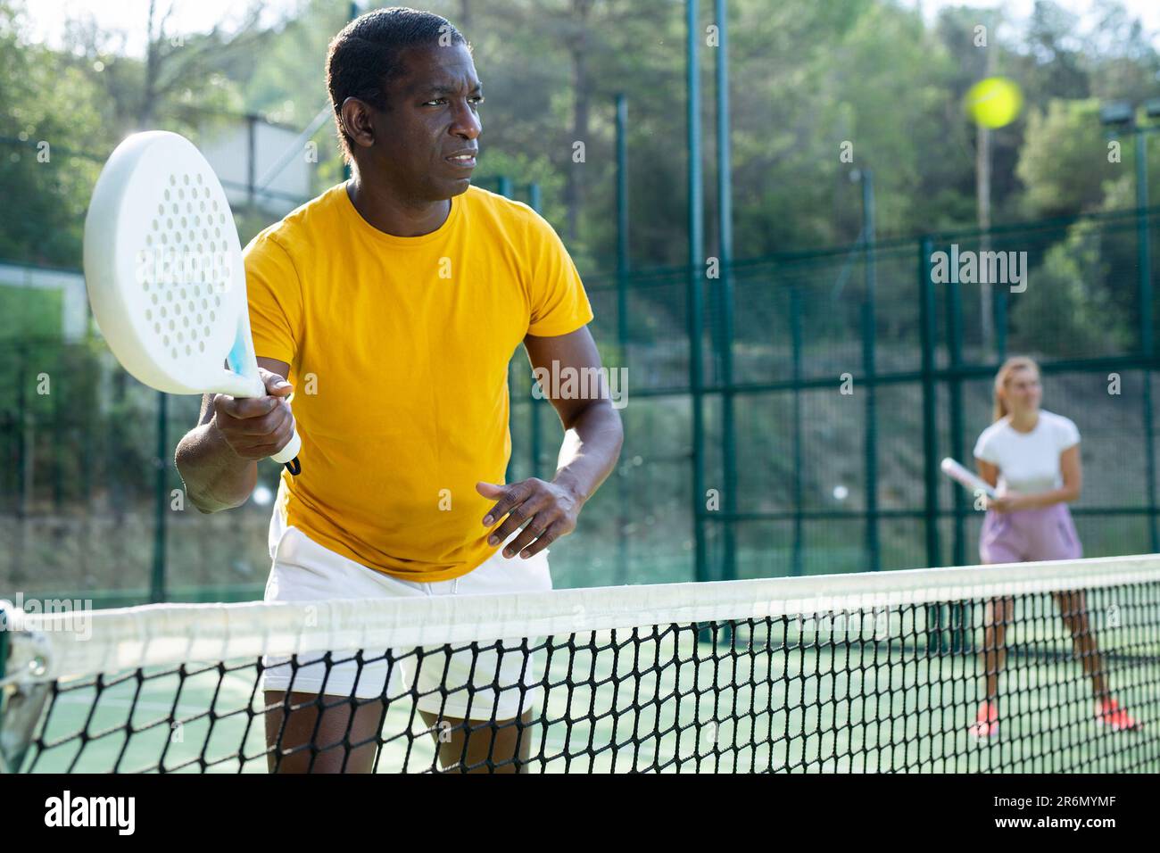 Tennis player hitting ball african hi-res stock photography and images ...