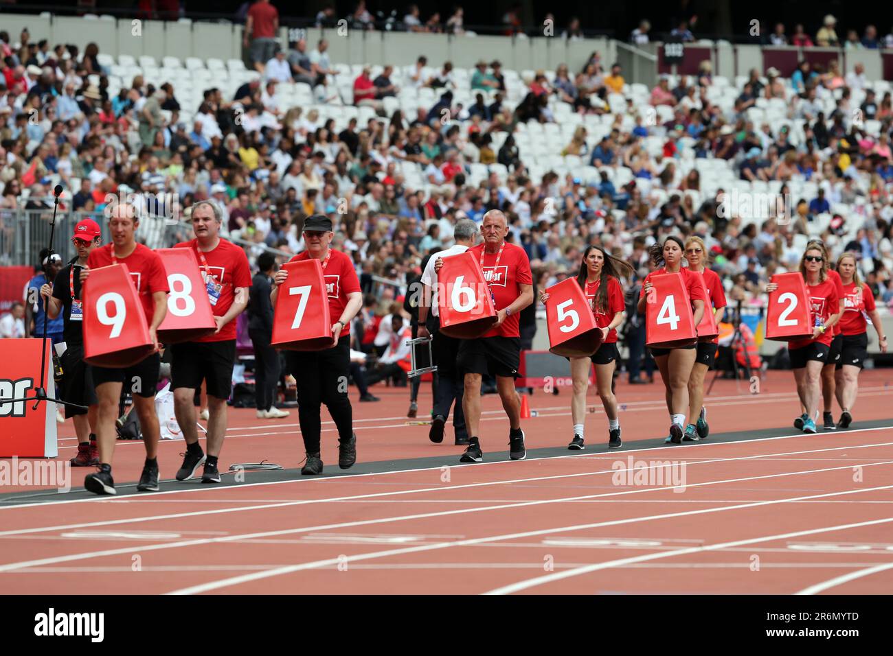 Volunteers setting up the Women's 800m Final at the 2019, IAAF Diamond ...