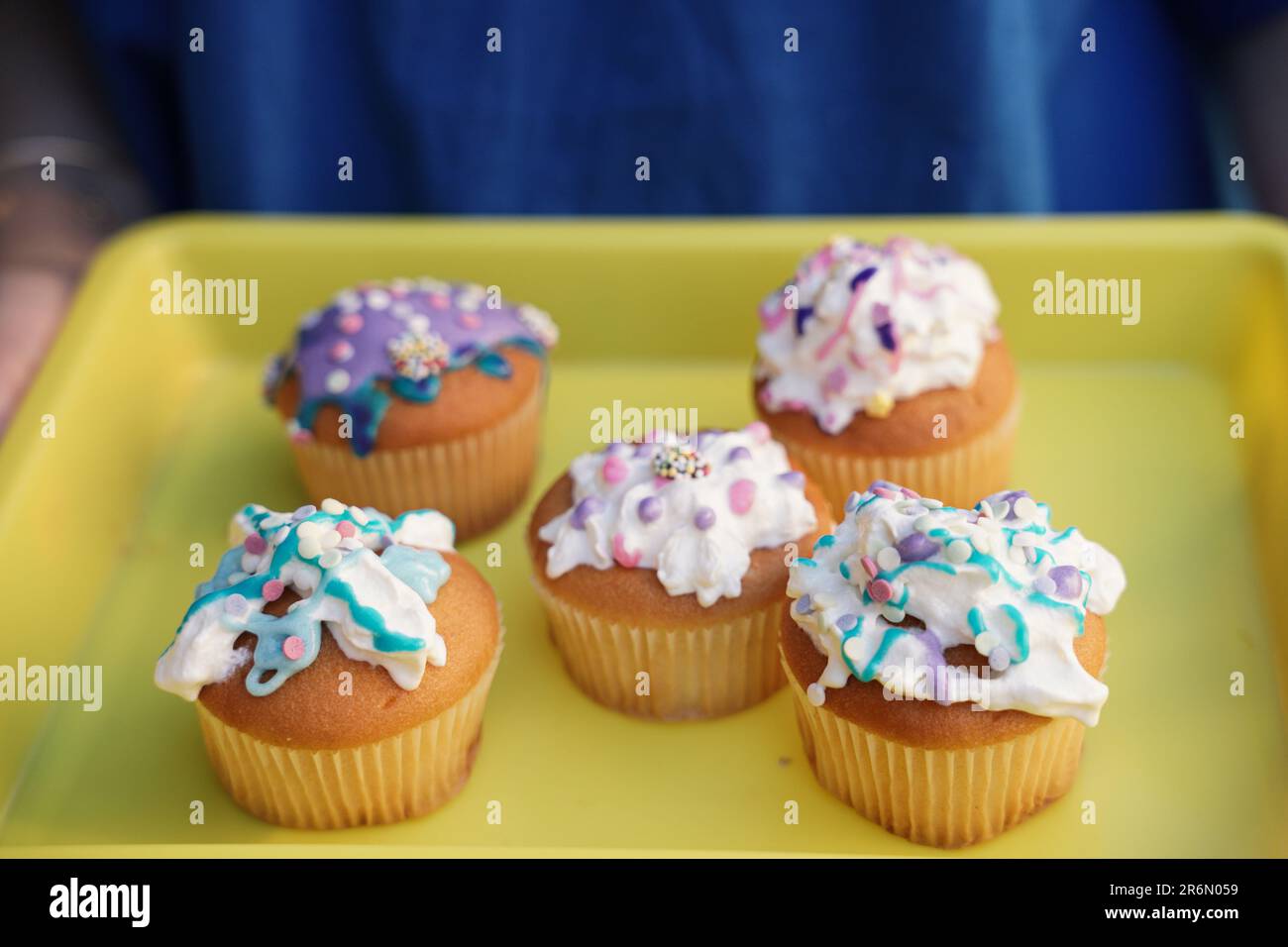 Kids home made cupcakes. many cupcakes with decoration, sprinkles and ...