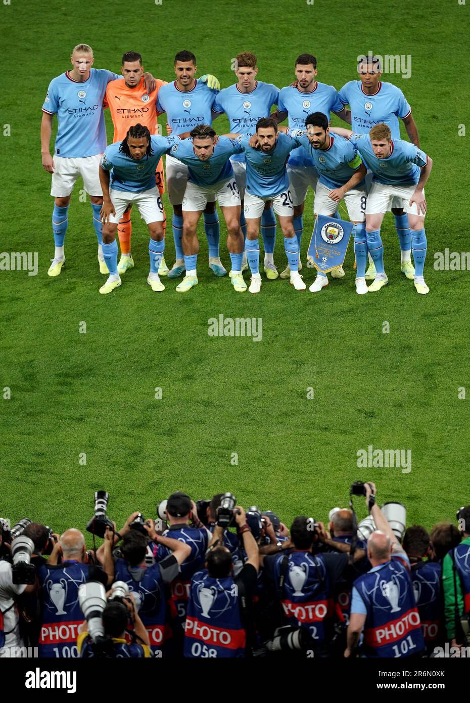The Manchester City starting eleven pose for a team group in front of ...