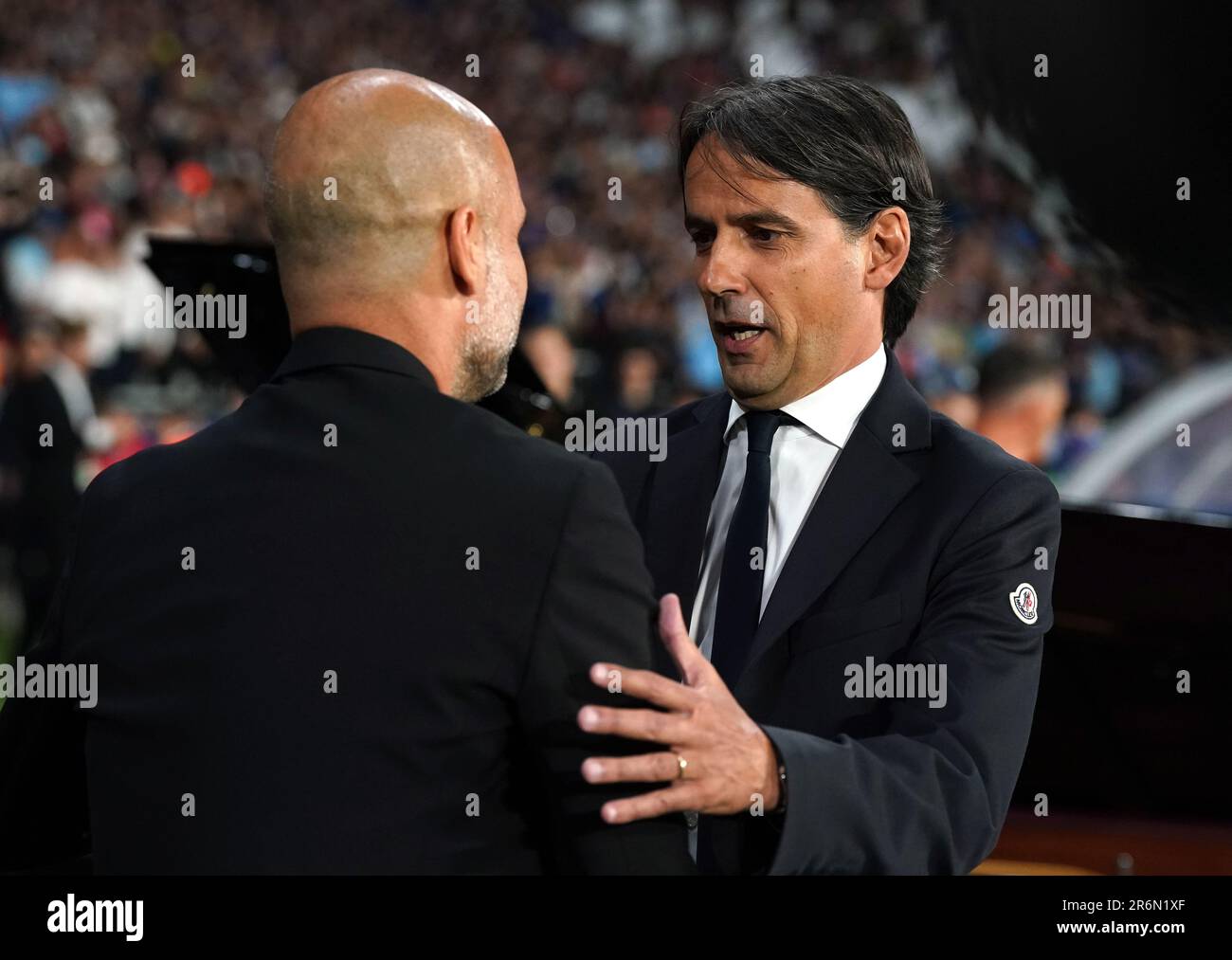 Inter Milan manager Simone Inzaghi (right) with Manchester City manager ...