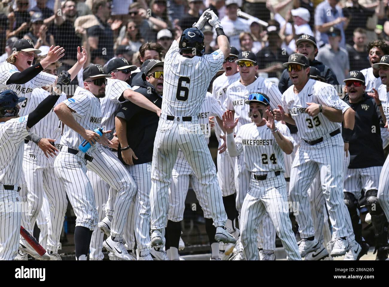 Wake Forest celebrates after infielder Justin Johnson (6) hit a home ...