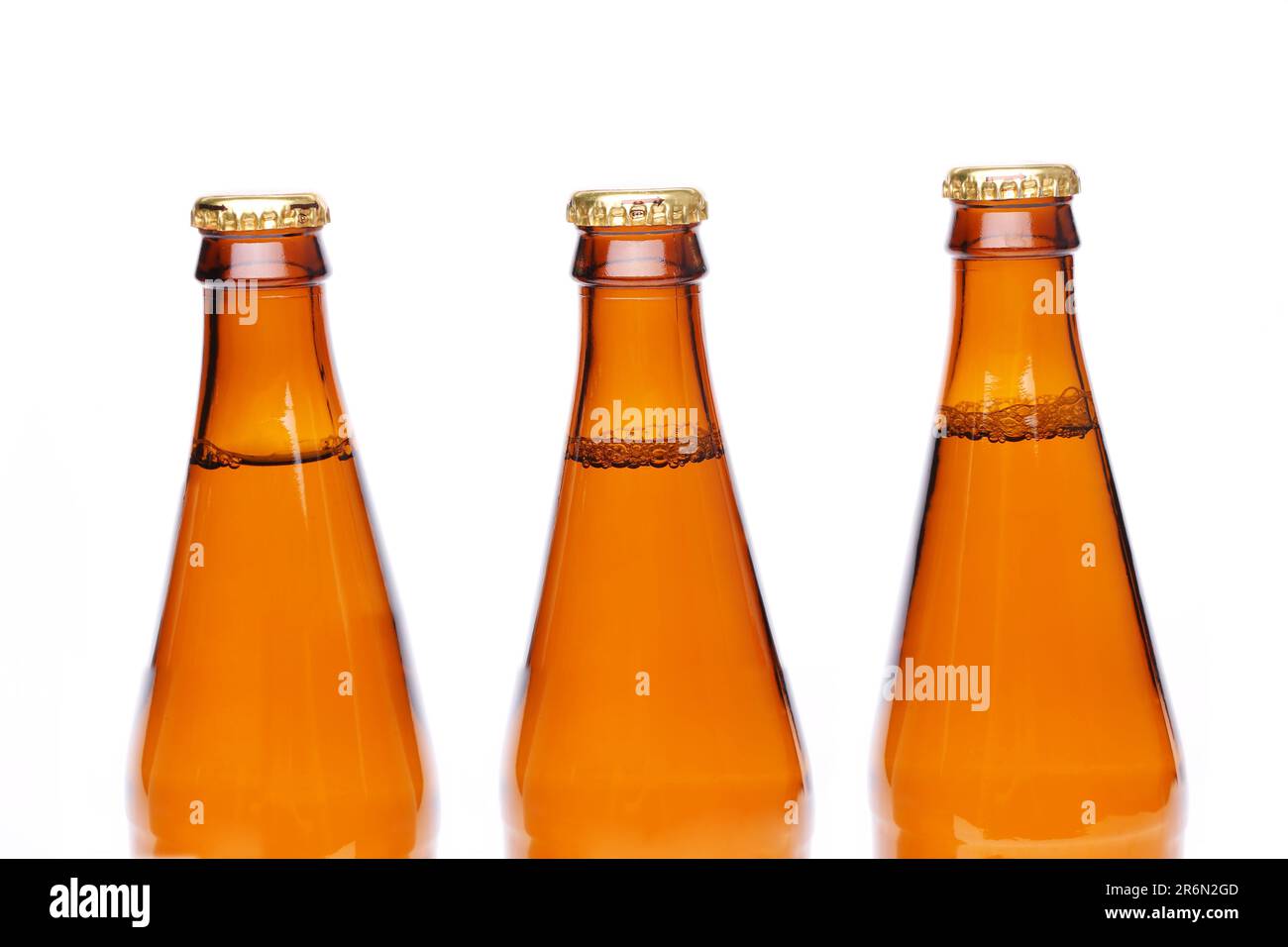 Three brown neck bottles Stock Photo - Alamy