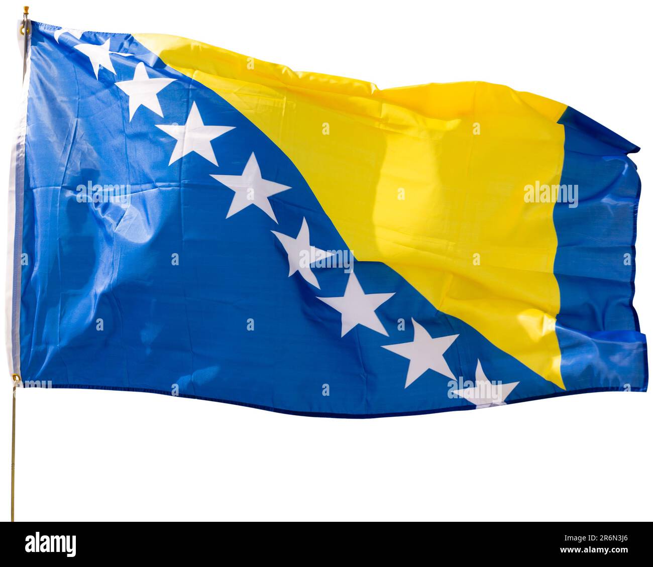 Flag of Bosnia and Herzegovina flying against blue sky Stock Photo - Alamy
