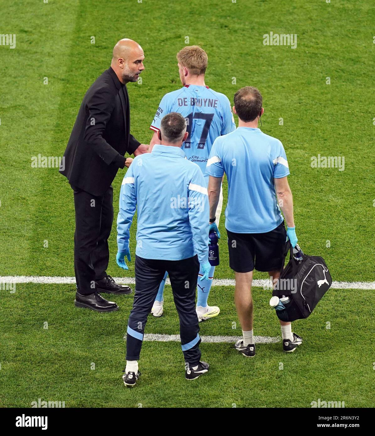 Manchester City manager Pep Guardiola with injured player Kevin De ...