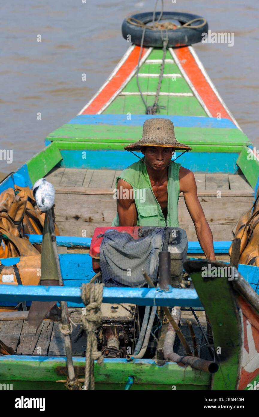 Water taxi or ferry boat driver at the Sin On Dam Jetty, Yangon River ...