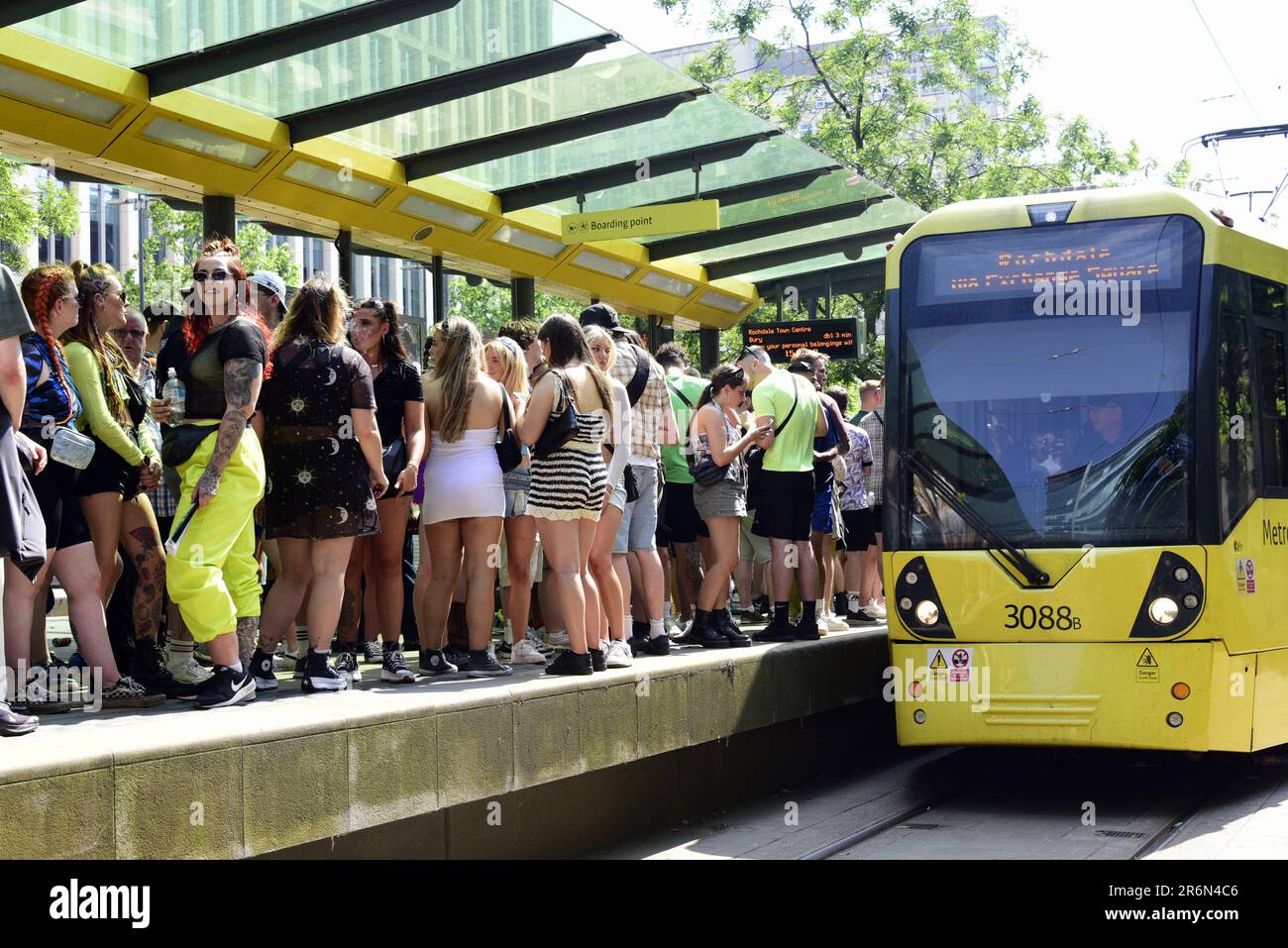 Manchester, UK. 10th June, 2023. Metrolink tram platforms are crowded ...