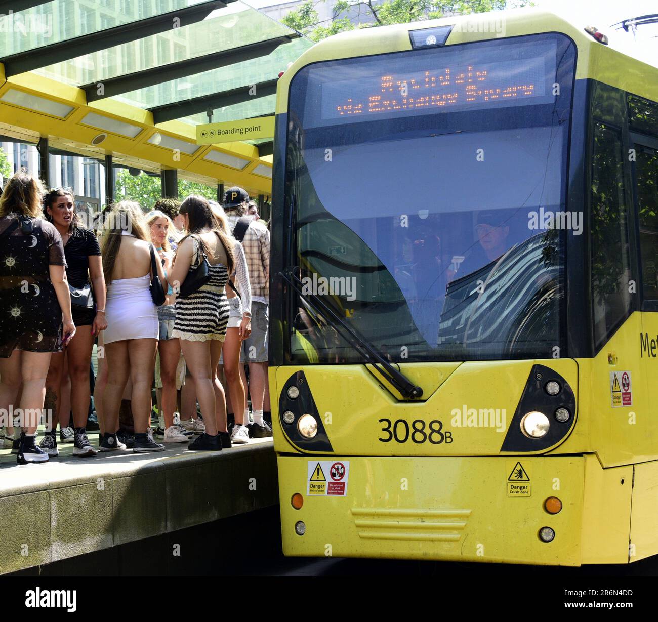 Manchester, UK. 10th June, 2023. Metrolink tram platforms are crowded ...
