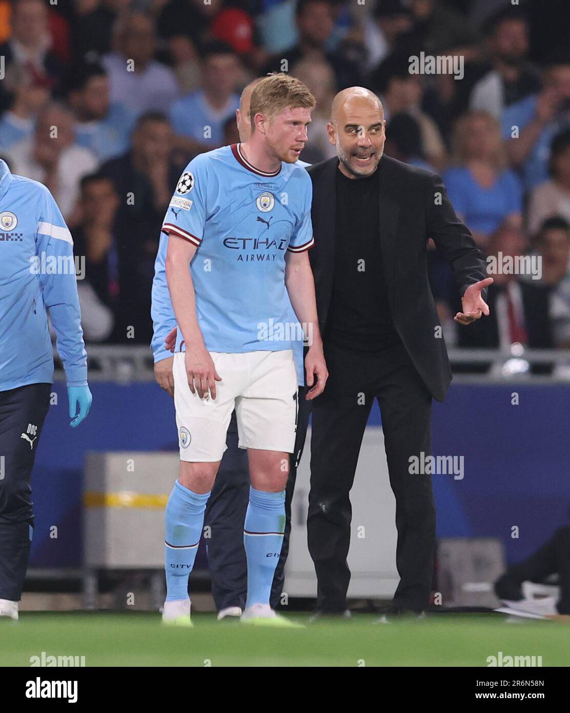 Istanbul, Turkey. 10th June, 2023. Josep Guardiola coach of Manchester City talks with Kevin De ...