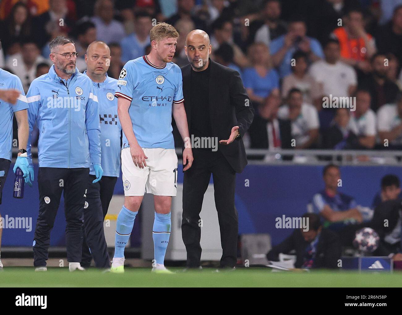 Istanbul, Turkey. 10th June, 2023. Josep Guardiola coach of Manchester City talks with Kevin De ...
