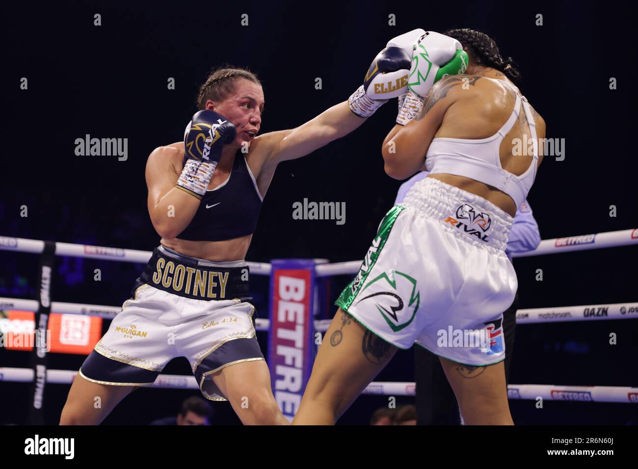 Ellie Scotney (left) hits out at Cherneka Johnson during the IBF Super ...