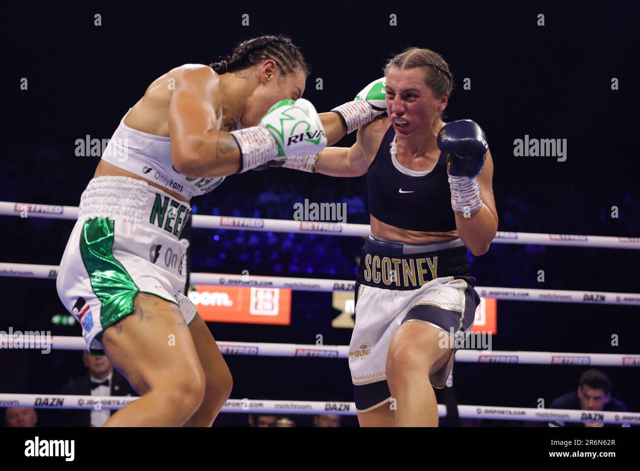 Cherneka Johnson (left) hits out at Ellie Scotney during the IBF Super ...